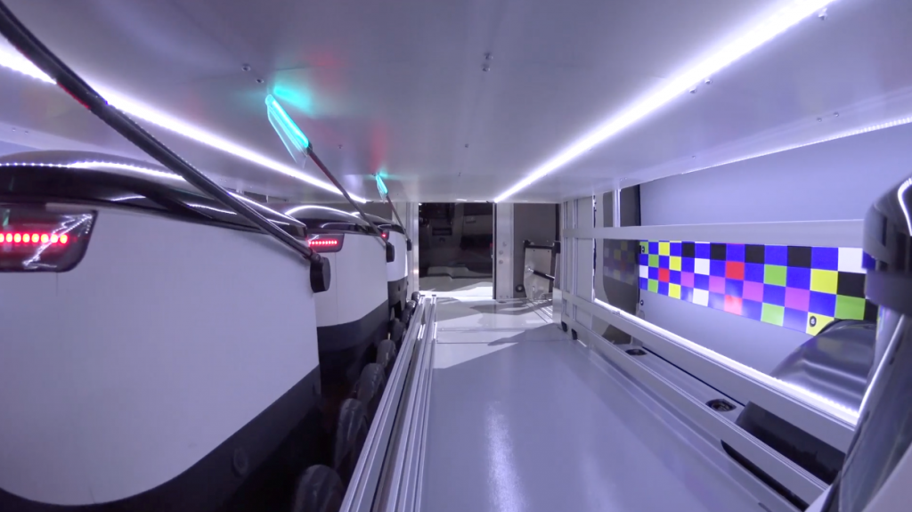 Integrating self-driving robots with delivery vans to provide local ...
